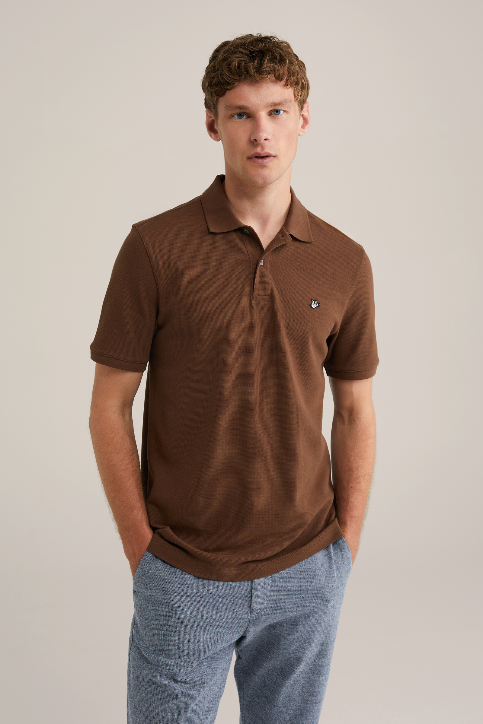 Polo slim fit homme à structure avec broderie | wefashion.com
