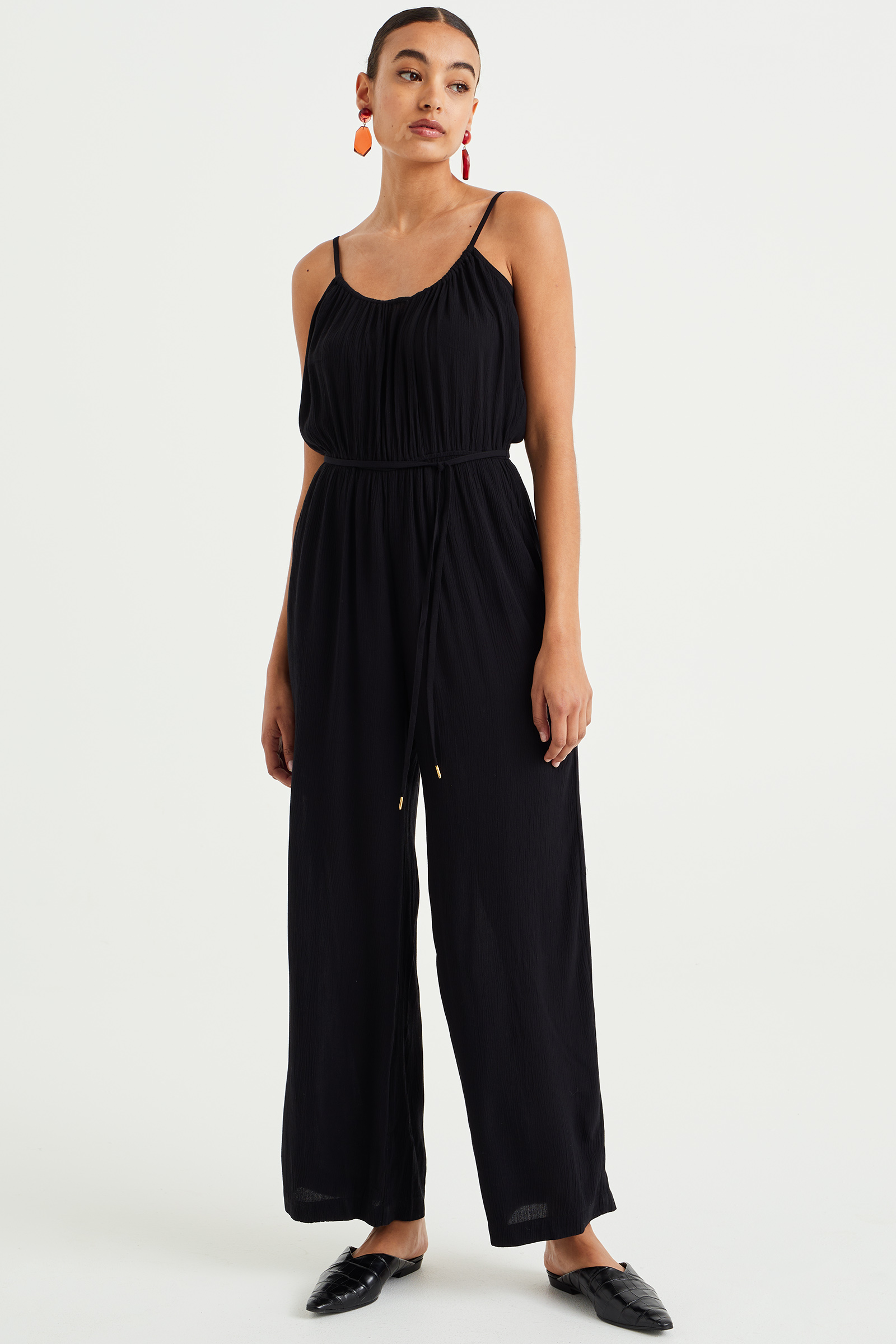 Dames jumpsuit met ceintuur | wefashion.com