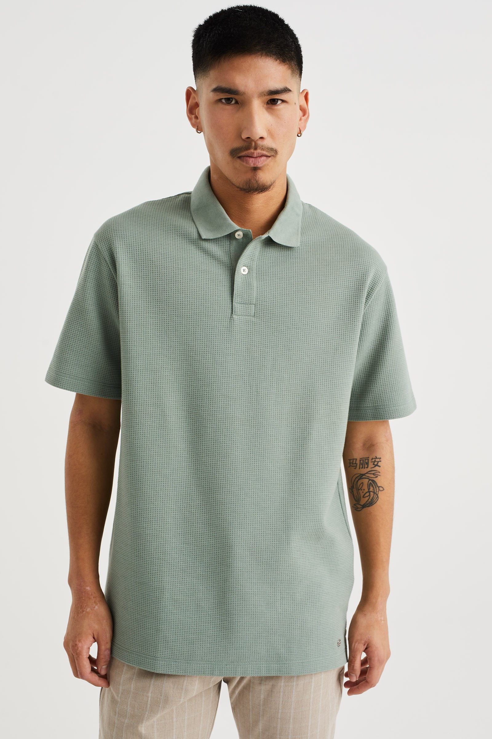 Heren relaxed fit polo met structuur | wefashion.com