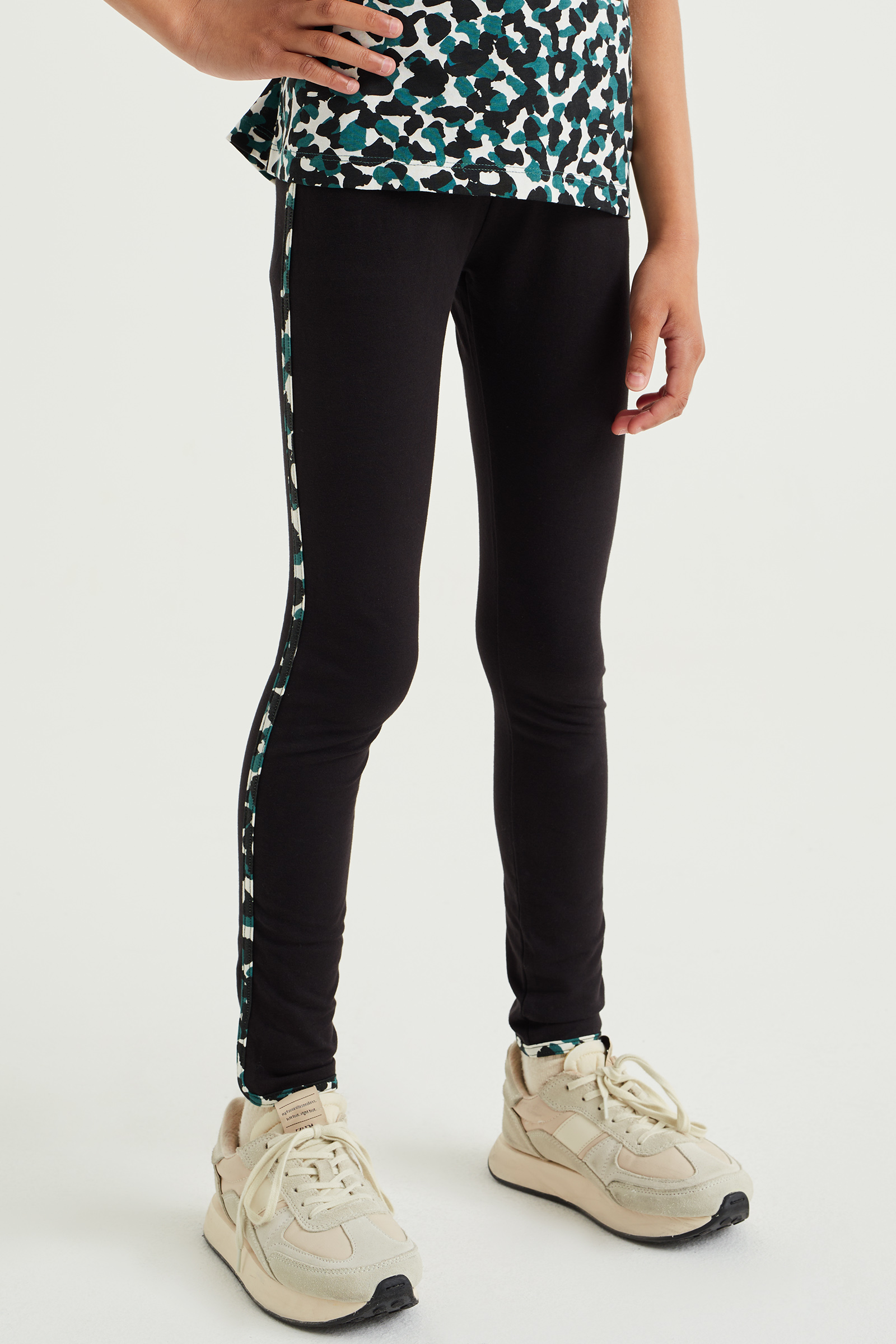 Meisjes legging met tapedetail | wefashion.com